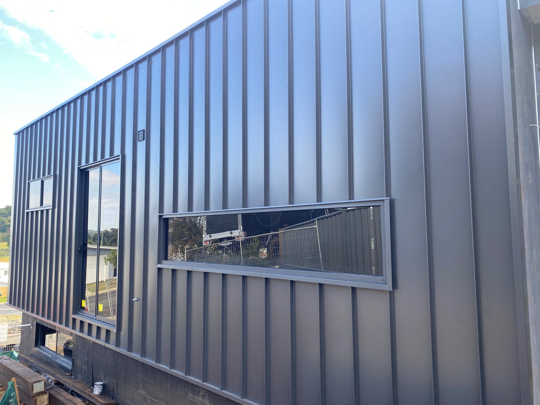 Striking Cladding in EPIC estate, Lennox Head - Skilled Roofing